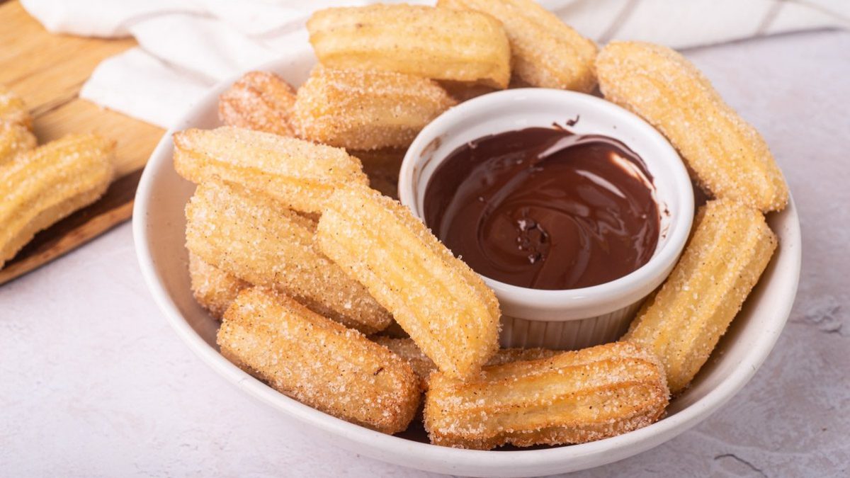 Churros donuts: a tasty Spanish dessert with a creamy chocolaty filling