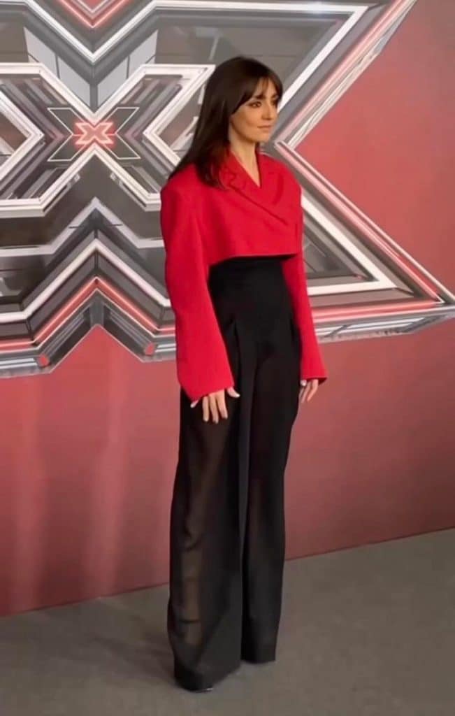Ambra Angiolini è pronta per la finale di X-Factor, alla conferenza con ...