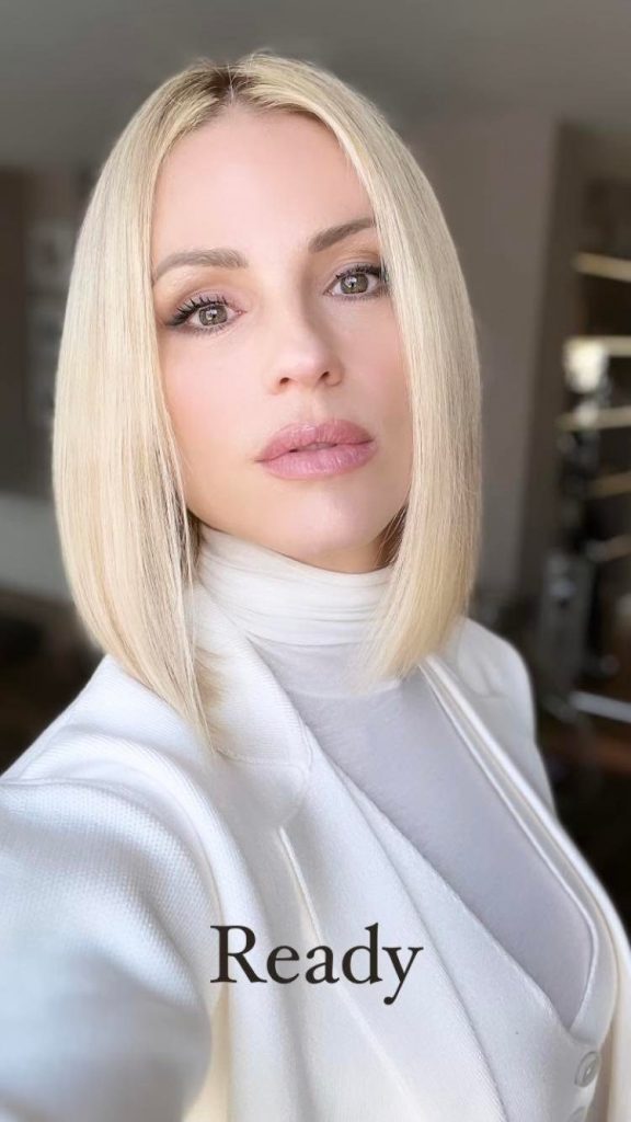 Michelle Hunziker in inverno con il look candido: abbina il collo alto ...